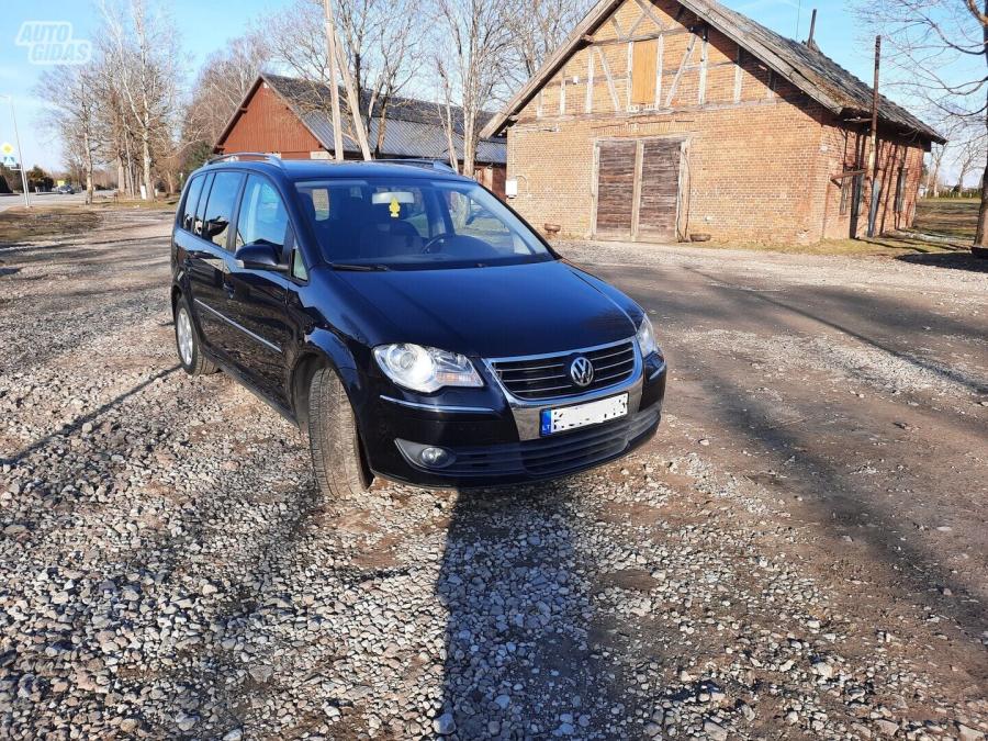 Black Volkswagen Touran 2007 in Kretinga, with an engine capacity of 2.00 L and mileage of 243 thousand km for 2400 €, photo 1 on AUTOMOTO.COM.LV