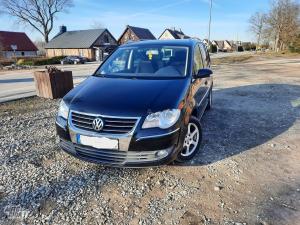 Black Volkswagen Touran 2007 in Kretinga, with an engine capacity of 2.00 L and mileage of 243 thousand km for 2400 €, photo 3 on AUTOMOTO.COM.LV