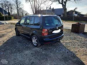 Black Volkswagen Touran 2007 in Kretinga, with an engine capacity of 2.00 L and mileage of 243 thousand km for 2400 €, photo 5 on AUTOMOTO.COM.LV