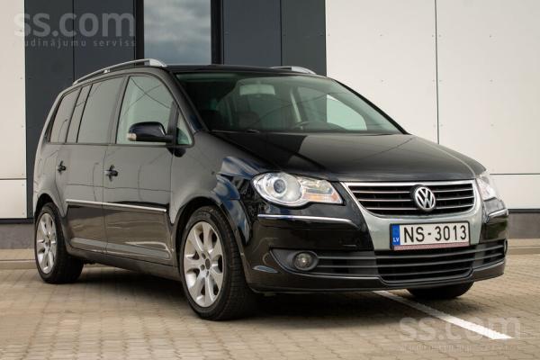 Melns Volkswagen Touran 2007 Jelgava, ar dzinēja tilpumu 2.00 L un nobraukumu 295 tūkst. km par 2650 €, foto 1 vietnē AUTOMOTO.COM.LV