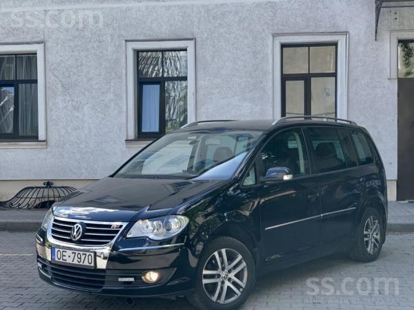 Melns Volkswagen Touran 2007 Rīga, ar dzinēja tilpumu 1.40 L un nobraukumu 242 tūkst. km par 4400 €, foto 2 vietnē AUTOMOTO.COM.LV