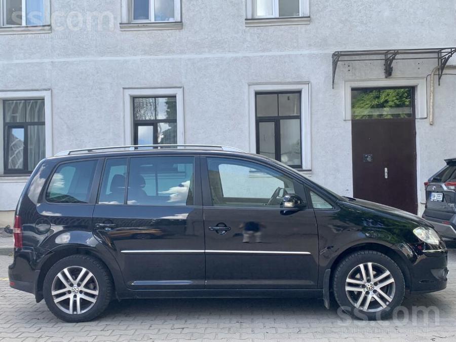 Melns Volkswagen Touran 2007 Rīga, ar dzinēja tilpumu 1.40 L un nobraukumu 242 tūkst. km par 4400 €, foto 14 vietnē AUTOMOTO.COM.LV
