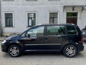 Melns Volkswagen Touran 2007 Rīga, ar dzinēja tilpumu 1.40 L un nobraukumu 242 tūkst. km par 4400 €, foto 16 vietnē AUTOMOTO.COM.LV