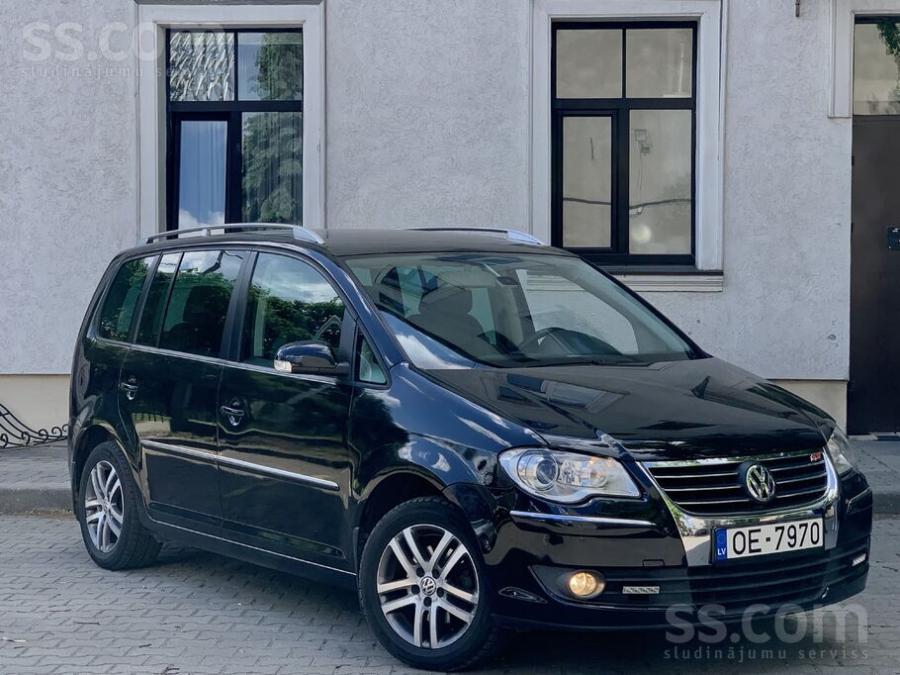 Melns Volkswagen Touran 2007 Rīga, ar dzinēja tilpumu 1.40 L un nobraukumu 242 tūkst. km par 4400 €, foto 17 vietnē AUTOMOTO.COM.LV