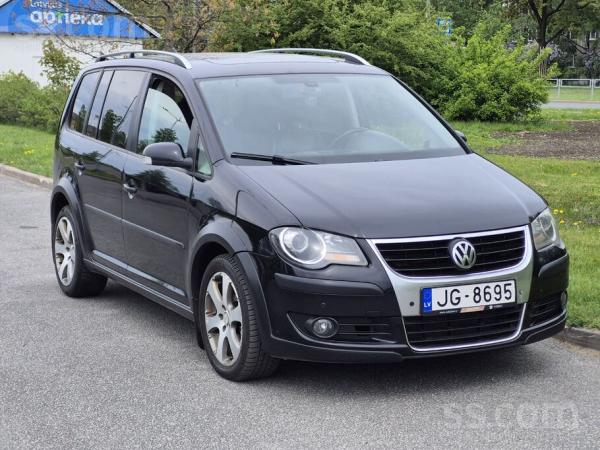 Black Volkswagen Touran 2007 in Riga, with an engine capacity of 2.00 L and mileage of 0 thousand km for 2690 €, photo 1 on AUTOMOTO.COM.LV