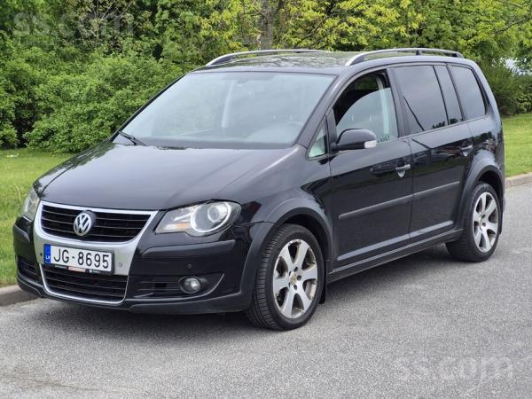 Black Volkswagen Touran 2007 in Riga, with an engine capacity of 2.00 L and mileage of 0 thousand km for 2690 €, photo 2 on AUTOMOTO.COM.LV
