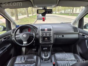 Melns Volkswagen Touran 2007 Rīga, ar dzinēja tilpumu 2.00 L un nobraukumu 0 tūkst. km par 2690 €, foto 10 vietnē AUTOMOTO.COM.LV