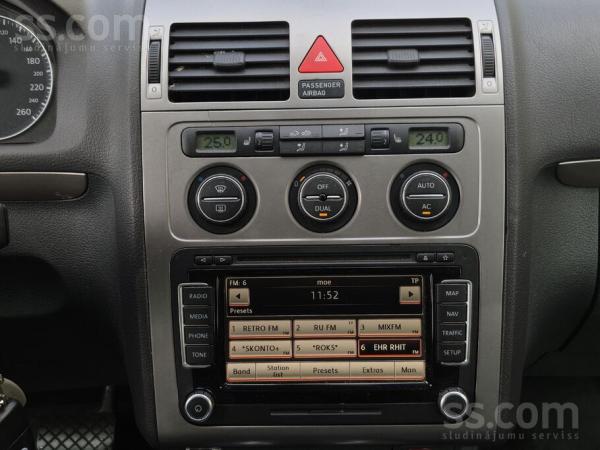 Black Volkswagen Touran 2007 in Riga, with an engine capacity of 2.00 L and mileage of 0 thousand km for 2690 €, photo 10 on AUTOMOTO.COM.LV