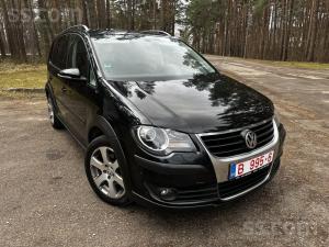 Black Volkswagen Touran 2007 in Jurmala, with an engine capacity of 1.40 L and mileage of 195 thousand km for 4590 €, photo 7 on AUTOMOTO.COM.LV