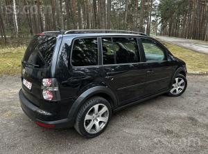 Black Volkswagen Touran 2007 in Jurmala, with an engine capacity of 1.40 L and mileage of 195 thousand km for 4590 €, photo 13 on AUTOMOTO.COM.LV