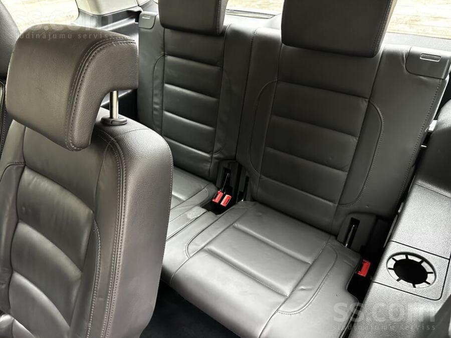 Black Volkswagen Touran 2007 in Jurmala, with an engine capacity of 1.40 L and mileage of 195 thousand km for 4590 €, photo 23 on AUTOMOTO.COM.LV