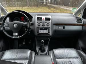 Black Volkswagen Touran 2007 in Jurmala, with an engine capacity of 1.40 L and mileage of 195 thousand km for 4590 €, photo 29 on AUTOMOTO.COM.LV
