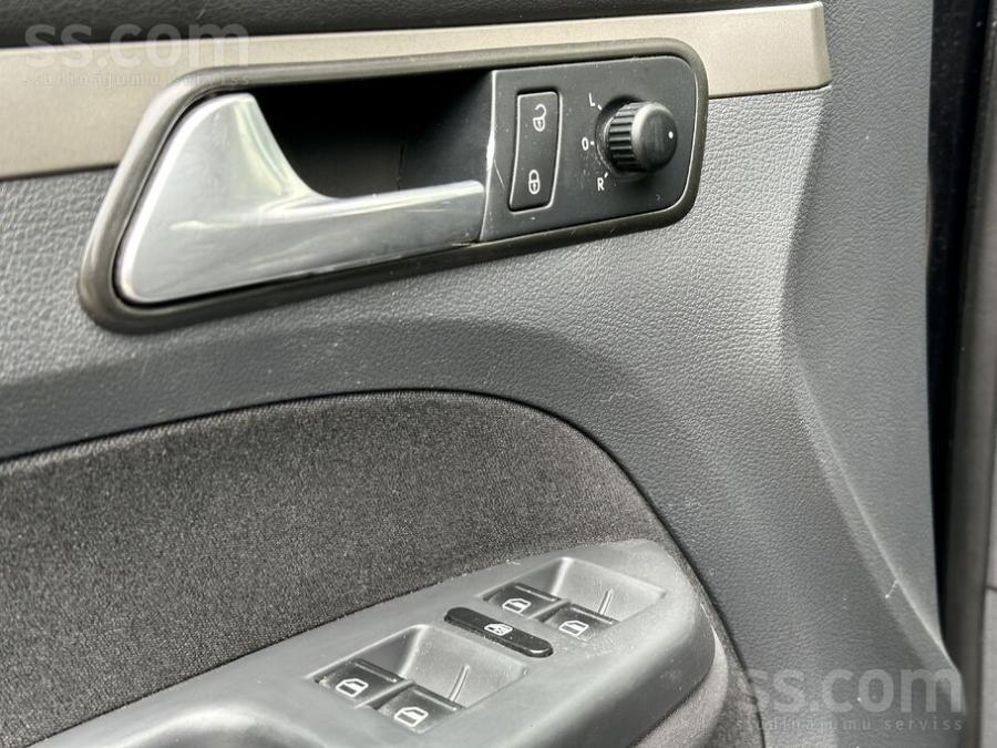 Melns Volkswagen Touran 2007 Jelgava, ar dzinēja tilpumu 2.00 L un nobraukumu 337 tūkst. km par 3450 €, foto 8 vietnē AUTOMOTO.COM.LV