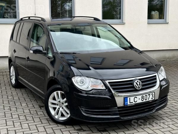 Melns Volkswagen Touran 2007 Jelgava, ar dzinēja tilpumu 2.00 L un nobraukumu 337 tūkst. km par 2850 €, foto 3 vietnē AUTOMOTO.COM.LV