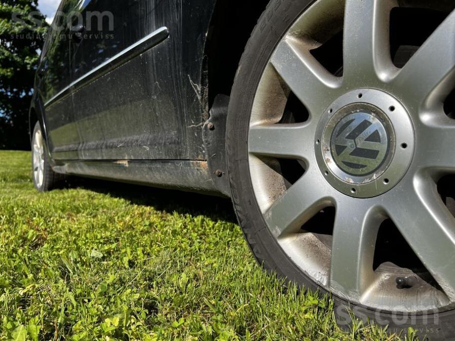 Black Volkswagen Touran 2007 in Riga, with an engine capacity of 2.00 L and mileage of 0 thousand km for 900 €, photo 11 on AUTOMOTO.COM.LV