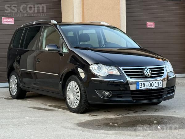 Melns Volkswagen Touran 2007 Ogre, ar dzinēja tilpumu 1.60 L un nobraukumu 153 tūkst. km par 4995 €, foto 3 vietnē AUTOMOTO.COM.LV
