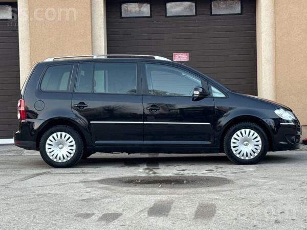 Melns Volkswagen Touran 2007 Ogre, ar dzinēja tilpumu 1.60 L un nobraukumu 153 tūkst. km par 4995 €, foto 7 vietnē AUTOMOTO.COM.LV