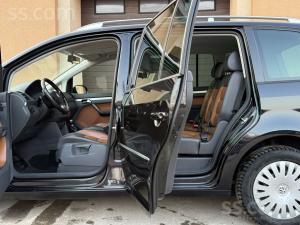 Melns Volkswagen Touran 2007 Ogre, ar dzinēja tilpumu 1.60 L un nobraukumu 153 tūkst. km par 4995 €, foto 10 vietnē AUTOMOTO.COM.LV