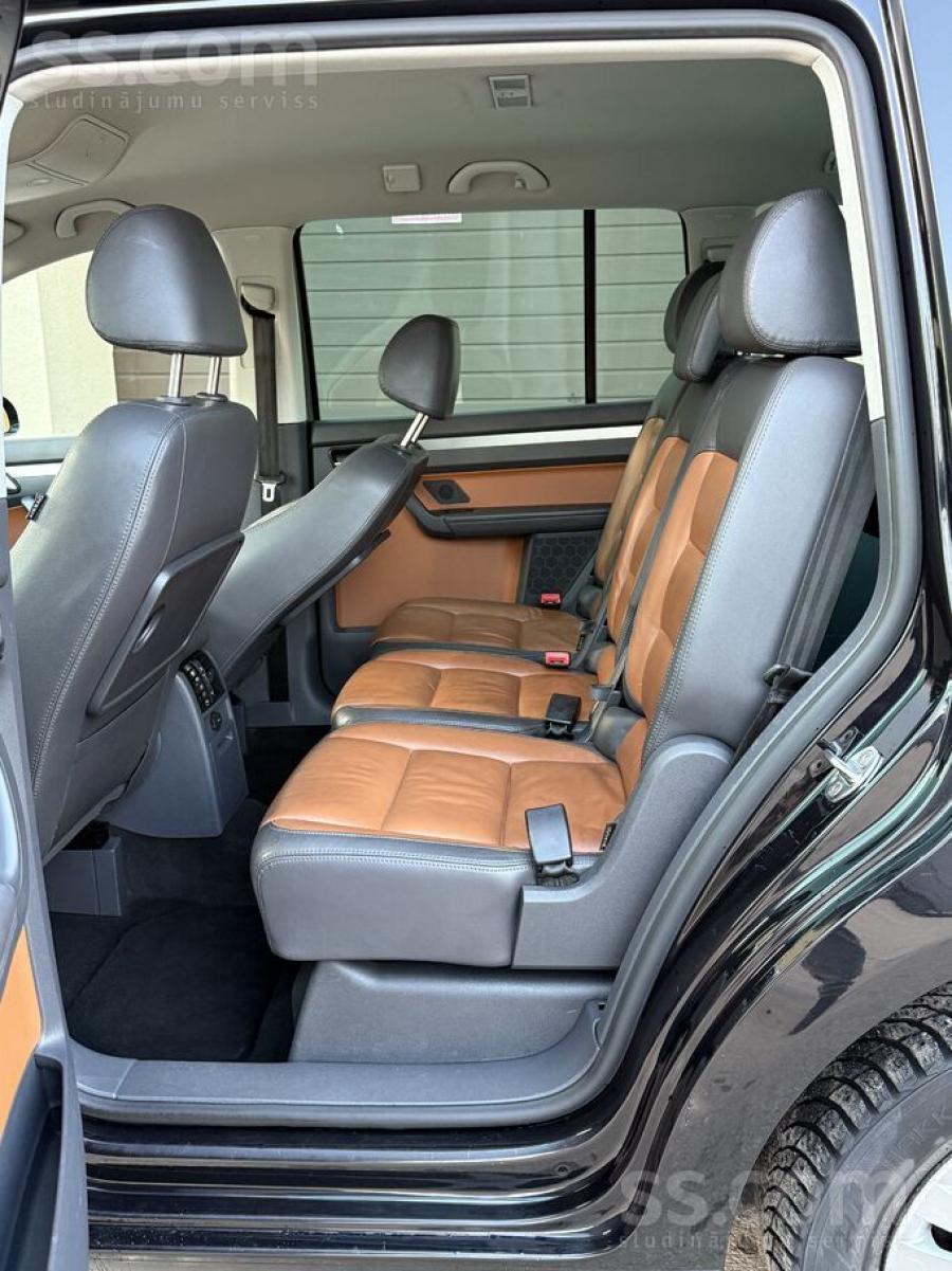 Melns Volkswagen Touran 2007 Ogre, ar dzinēja tilpumu 1.60 L un nobraukumu 153 tūkst. km par 4995 €, foto 12 vietnē AUTOMOTO.COM.LV
