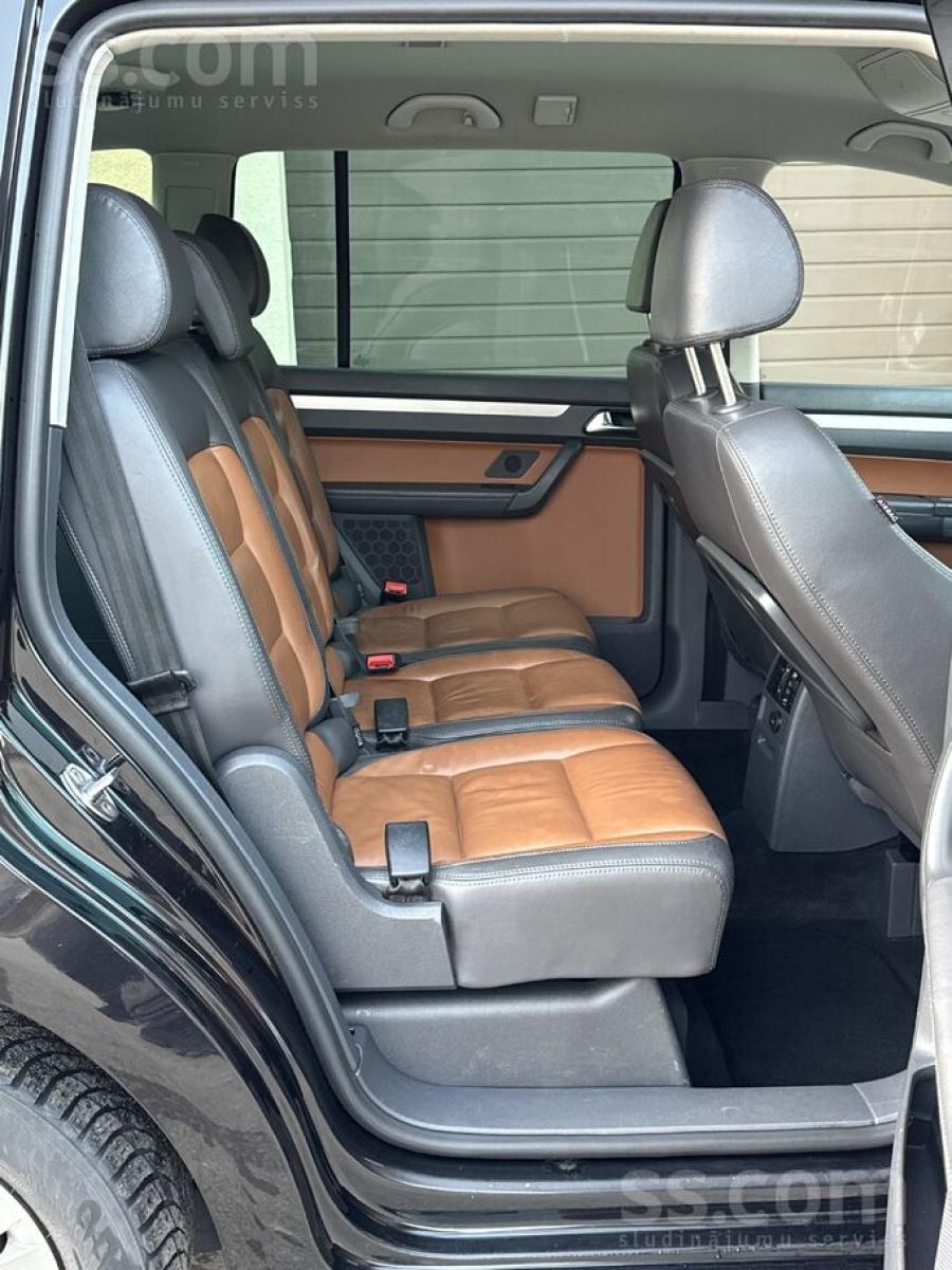 Melns Volkswagen Touran 2007 Ogre, ar dzinēja tilpumu 1.60 L un nobraukumu 153 tūkst. km par 4995 €, foto 17 vietnē AUTOMOTO.COM.LV