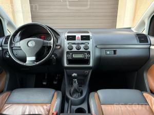Melns Volkswagen Touran 2007 Ogre, ar dzinēja tilpumu 1.60 L un nobraukumu 153 tūkst. km par 4995 €, foto 20 vietnē AUTOMOTO.COM.LV