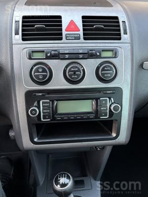 Melns Volkswagen Touran 2007 Ogre, ar dzinēja tilpumu 1.60 L un nobraukumu 153 tūkst. km par 4995 €, foto 22 vietnē AUTOMOTO.COM.LV