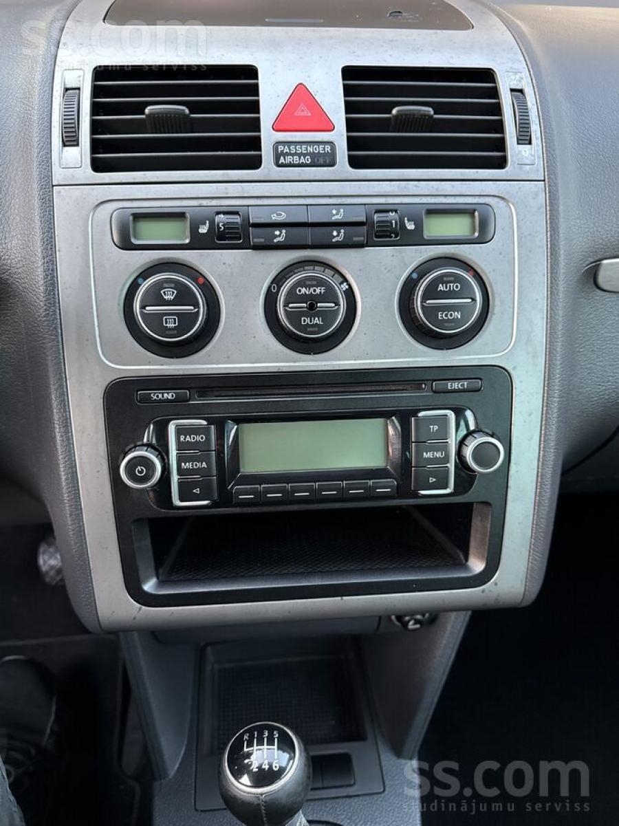 Melns Volkswagen Touran 2007 Ogre, ar dzinēja tilpumu 1.60 L un nobraukumu 153 tūkst. km par 4995 €, foto 22 vietnē AUTOMOTO.COM.LV