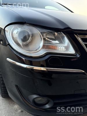 Melns Volkswagen Touran 2007 Ogre, ar dzinēja tilpumu 1.60 L un nobraukumu 153 tūkst. km par 4995 €, foto 25 vietnē AUTOMOTO.COM.LV