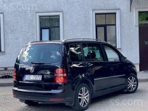 Melns Volkswagen Touran 2007 Rīga, ar dzinēja tilpumu 1.40 L un nobraukumu 242 tūkst. km par 3950 €, foto 6 vietnē AUTOMOTO.COM.LV