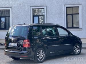 Melns Volkswagen Touran 2007 Rīga, ar dzinēja tilpumu 1.40 L un nobraukumu 242 tūkst. km par 3950 €, foto 7 vietnē AUTOMOTO.COM.LV