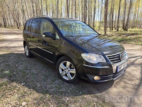Melns Volkswagen Touran 2007 Rīga, ar dzinēja tilpumu 2.00 L un nobraukumu 335 tūkst. km par 2300 €, foto 1 vietnē AUTOMOTO.COM.LV