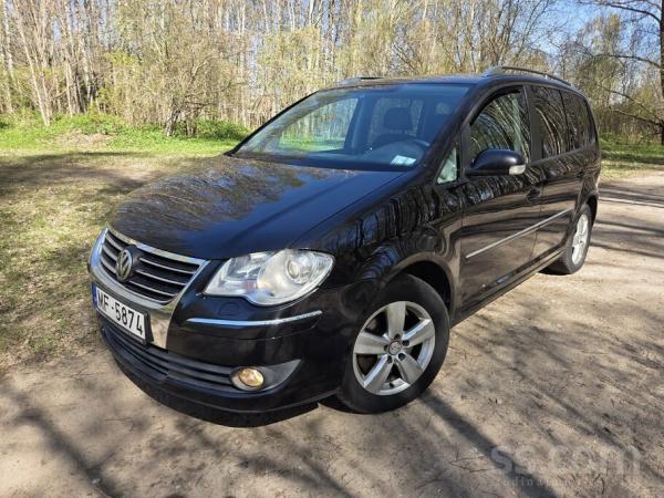Melns Volkswagen Touran 2007 Rīga, ar dzinēja tilpumu 2.00 L un nobraukumu 335 tūkst. km par 2300 €, foto 2 vietnē AUTOMOTO.COM.LV