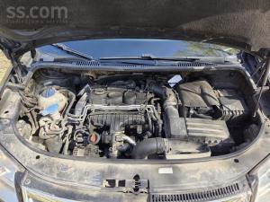 Melns Volkswagen Touran 2007 Rīga, ar dzinēja tilpumu 2.00 L un nobraukumu 335 tūkst. km par 2300 €, foto 8 vietnē AUTOMOTO.COM.LV