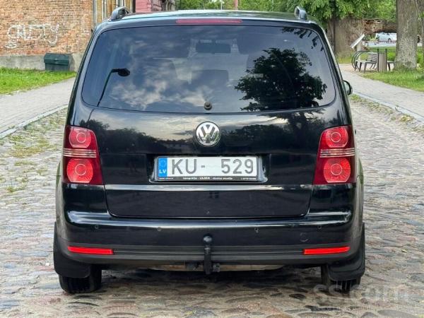 Melns Volkswagen Touran 2007 Jelgava, ar dzinēja tilpumu 1.90 L un nobraukumu 348 tūkst. km par 2150 €, foto 6 vietnē AUTOMOTO.COM.LV