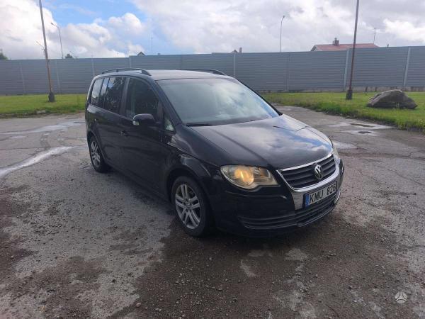 Black Volkswagen Touran 2007 in Panevezys, with an engine capacity of 1.97 L and mileage of 271 thousand km for 2700 €, photo 2 on AUTOMOTO.COM.LV