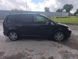 Black Volkswagen Touran 2007 in Panevezys, with an engine capacity of 1.97 L and mileage of 271 thousand km for 2700 €, photo 4 on AUTOMOTO.COM.LV