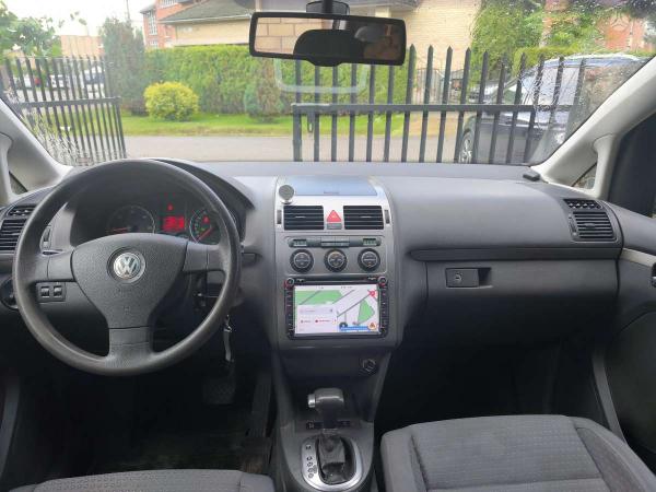 Black Volkswagen Touran 2007 in Panevezys, with an engine capacity of 1.97 L and mileage of 271 thousand km for 2700 €, photo 5 on AUTOMOTO.COM.LV