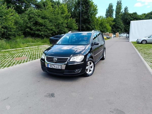 Black Volkswagen Touran 2007 in Vilnius, with an engine capacity of 1.90 L and mileage of 356 thousand km for 1999 €, photo 1 on AUTOMOTO.COM.LV