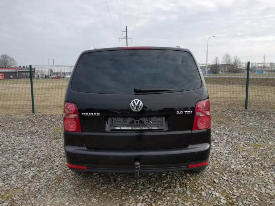Black Volkswagen Touran 2007 in Saldus, with an engine capacity of 2.00 L and mileage of 257 thousand km for 4300 €, photo 11 on AUTOMOTO.COM.LV