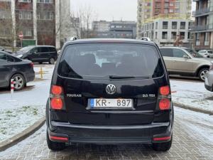 Black Volkswagen Touran 2007 in Riga, with an engine capacity of 2.00 L and mileage of 220 thousand km for 2990 €, photo 6 on AUTOMOTO.COM.LV