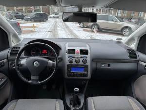 Black Volkswagen Touran 2007 in Riga, with an engine capacity of 2.00 L and mileage of 220 thousand km for 2990 €, photo 14 on AUTOMOTO.COM.LV