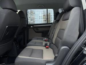 Black Volkswagen Touran 2007 in Riga, with an engine capacity of 2.00 L and mileage of 220 thousand km for 2990 €, photo 15 on AUTOMOTO.COM.LV
