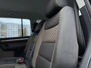 Black Volkswagen Touran 2007 in Riga, with an engine capacity of 2.00 L and mileage of 220 thousand km for 2990 €, photo 16 on AUTOMOTO.COM.LV