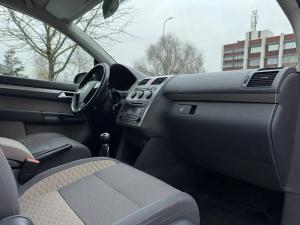 Black Volkswagen Touran 2007 in Riga, with an engine capacity of 2.00 L and mileage of 220 thousand km for 2990 €, photo 17 on AUTOMOTO.COM.LV