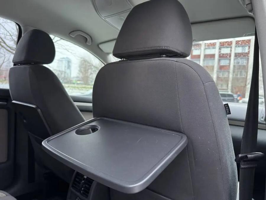 Black Volkswagen Touran 2007 in Riga, with an engine capacity of 2.00 L and mileage of 220 thousand km for 2990 €, photo 18 on AUTOMOTO.COM.LV