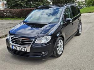 Black Volkswagen Touran 2007 in Jekabpils, with an engine capacity of 1.90 L and mileage of 280 thousand km for 2990 €, photo  on AUTOMOTO.COM.LV
