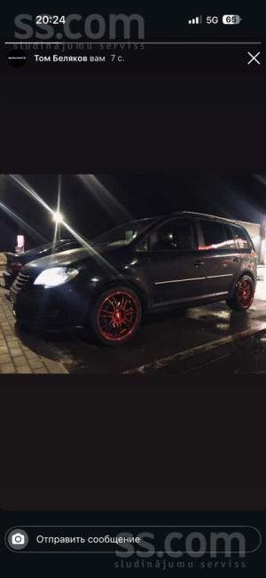 Black Volkswagen Touran 2007 in Riga, with an engine capacity of 2.00 L and mileage of 356 thousand km for 3250 €, photo 11 on AUTOMOTO.COM.LV