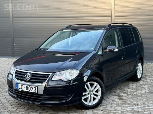 Black Volkswagen Touran 2007 in Jelgava, with an engine capacity of 2.00 L and mileage of 337 thousand km for 2850 €, photo 1 on AUTOMOTO.COM.LV