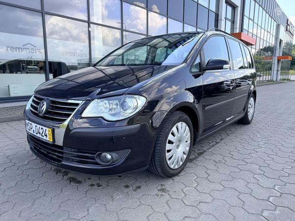 Black Volkswagen Touran 2007 in Vilnius, with an engine capacity of 1.97 L and mileage of 224 thousand km for 3700 €, photo 1 on AUTOMOTO.COM.LV