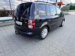 Black Volkswagen Touran 2007 in Vilnius, with an engine capacity of 1.97 L and mileage of 224 thousand km for 3700 €, photo 5 on AUTOMOTO.COM.LV
